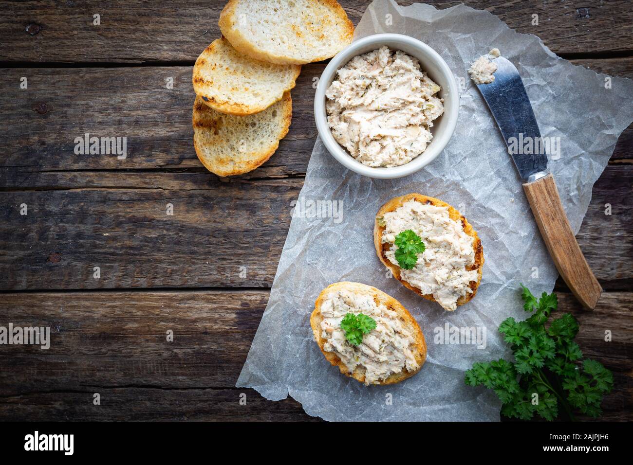 Sandwiches with salmon pate and baguette, fish bruschetta, top view ...