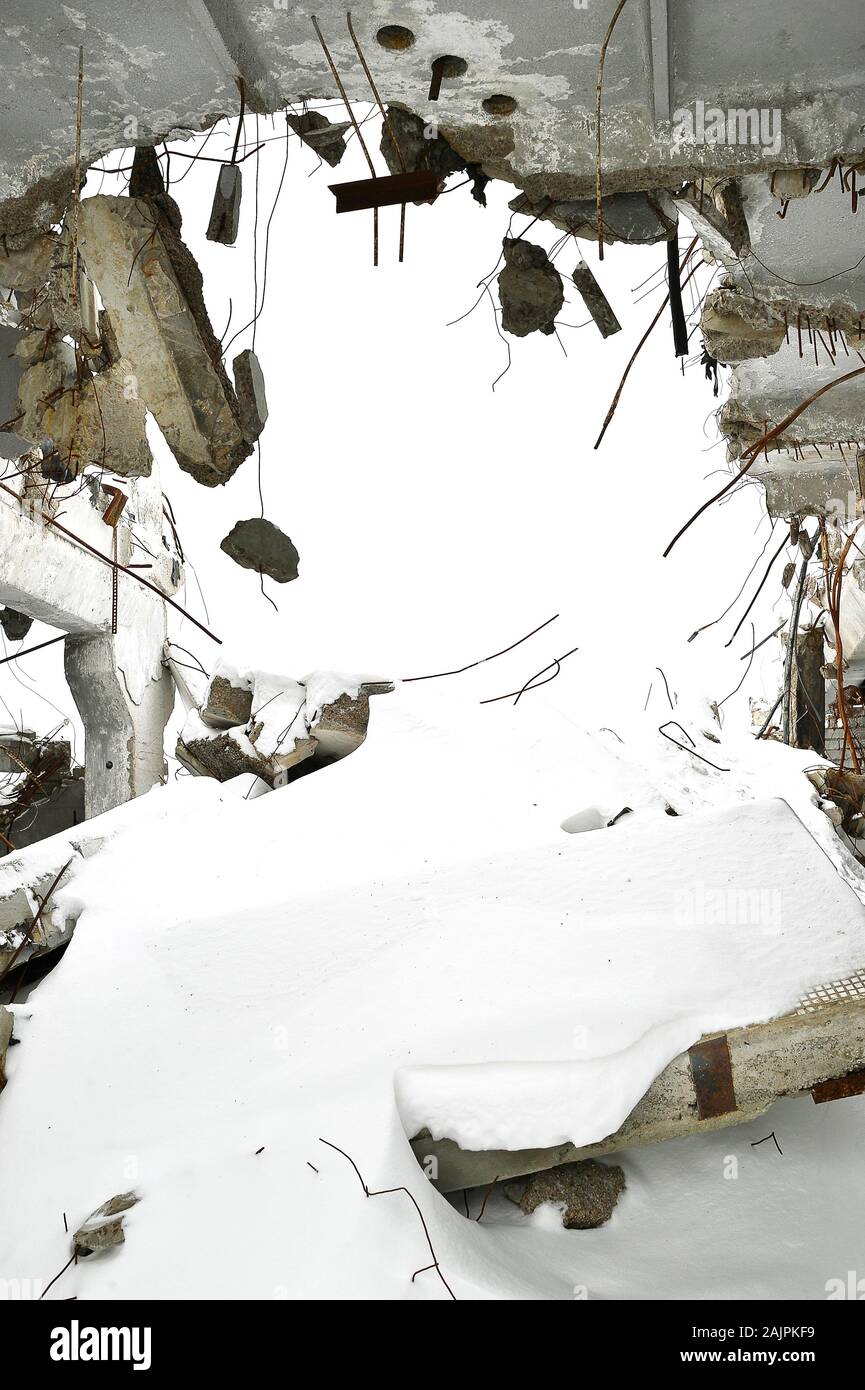The fissure in the roof of the massive concrete building. Snow through ...