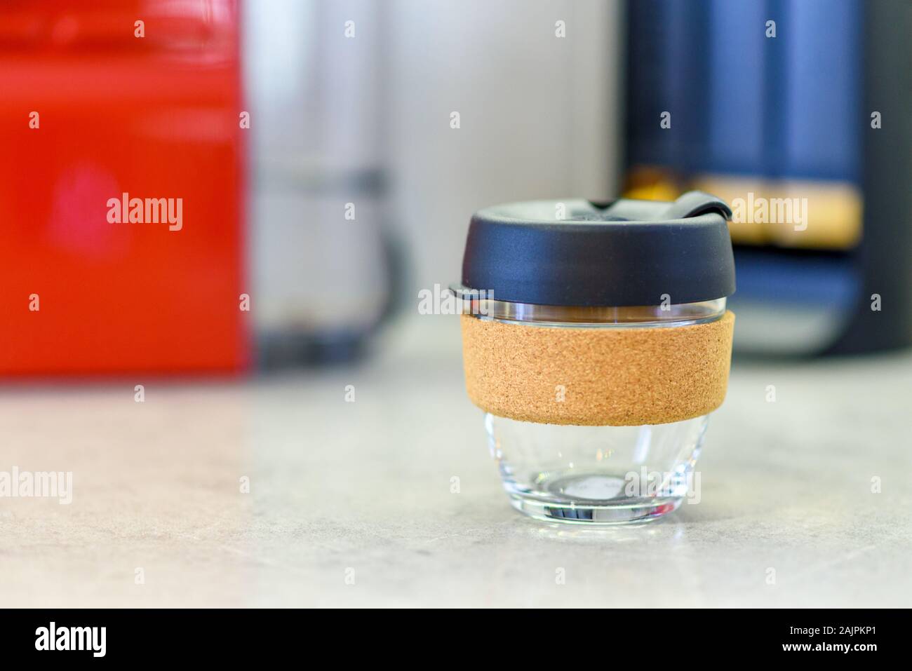 Reusable glass coffee cup in the kitchen. Zero waste concept. Bring ...