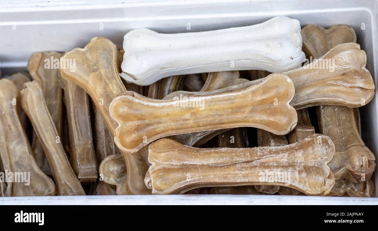 Bones of white color. Awarded for dogs. Nutritious. Photographed in pet ...
