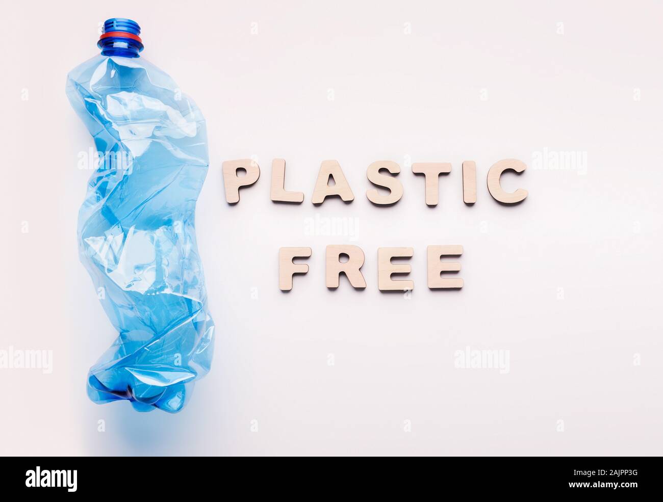 Plastic free concept. Plastic crumpled bottle isolated on white ...