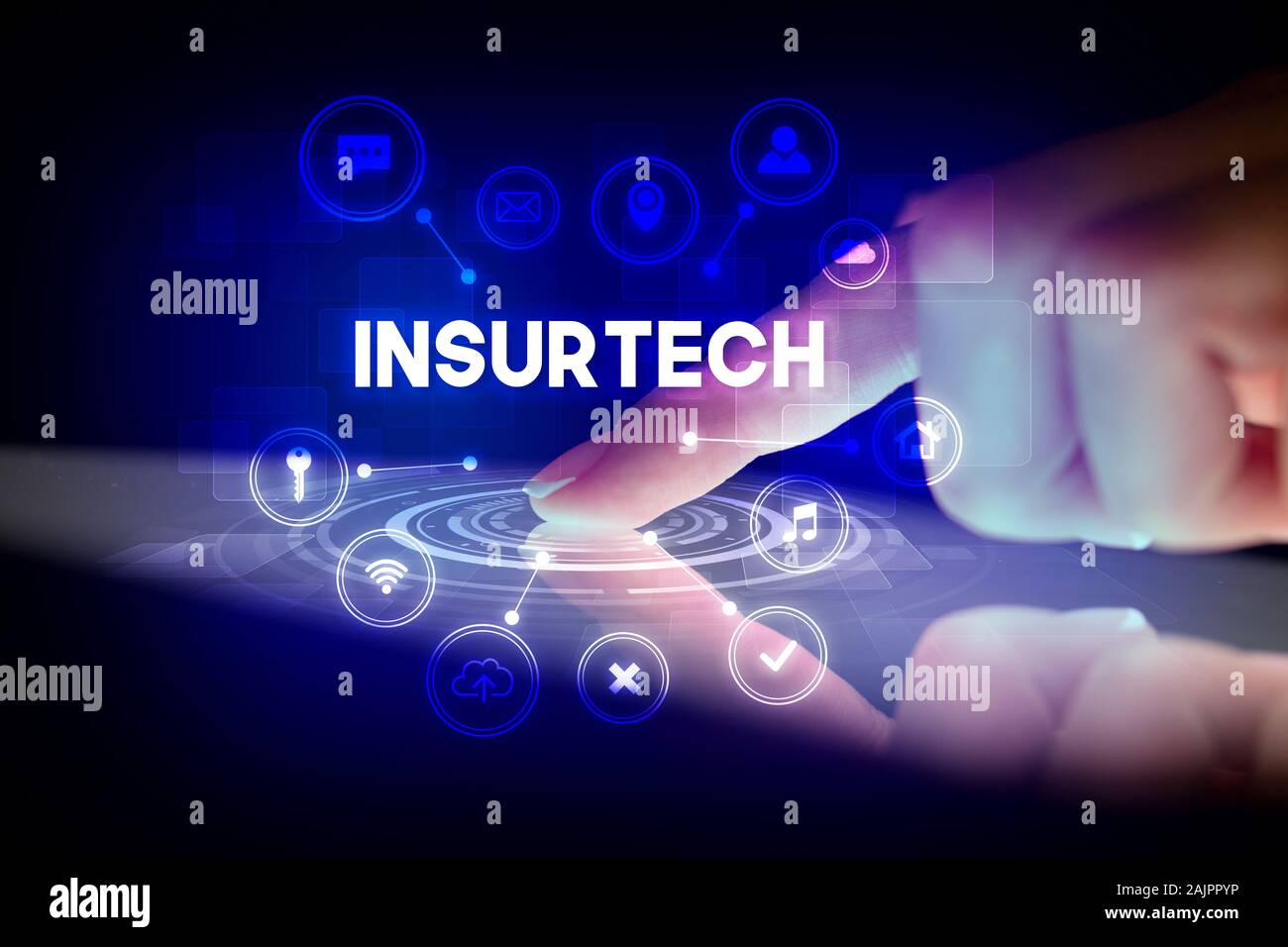 Finger touching tablet with web technology icons and INSURTECH ...