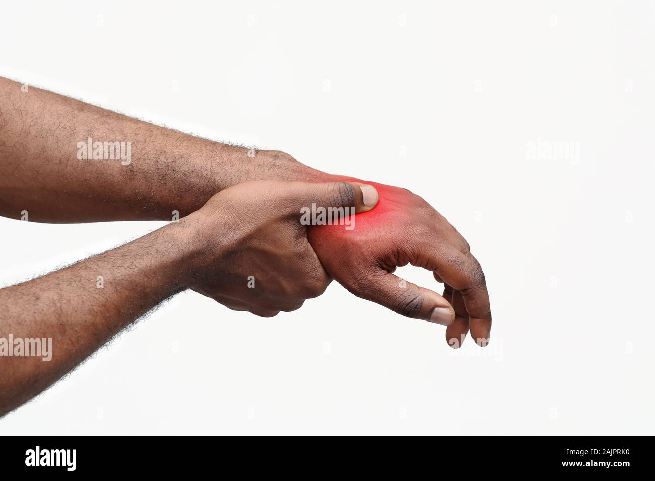 Close up of afro man massaging his highlighted hand, osteoarthritis ...