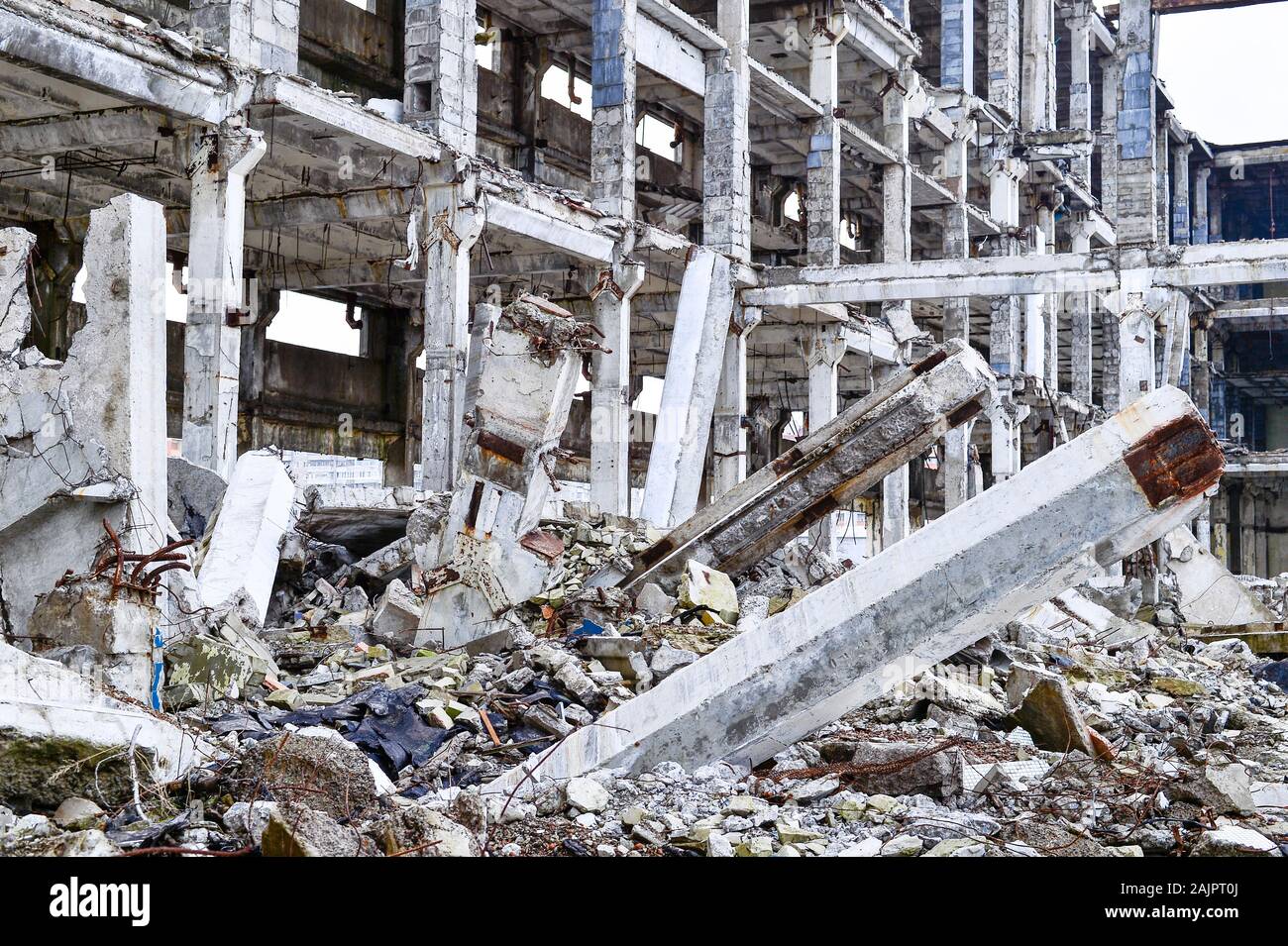 Remains of the destroyed industrial building. The skeleton of a large ...