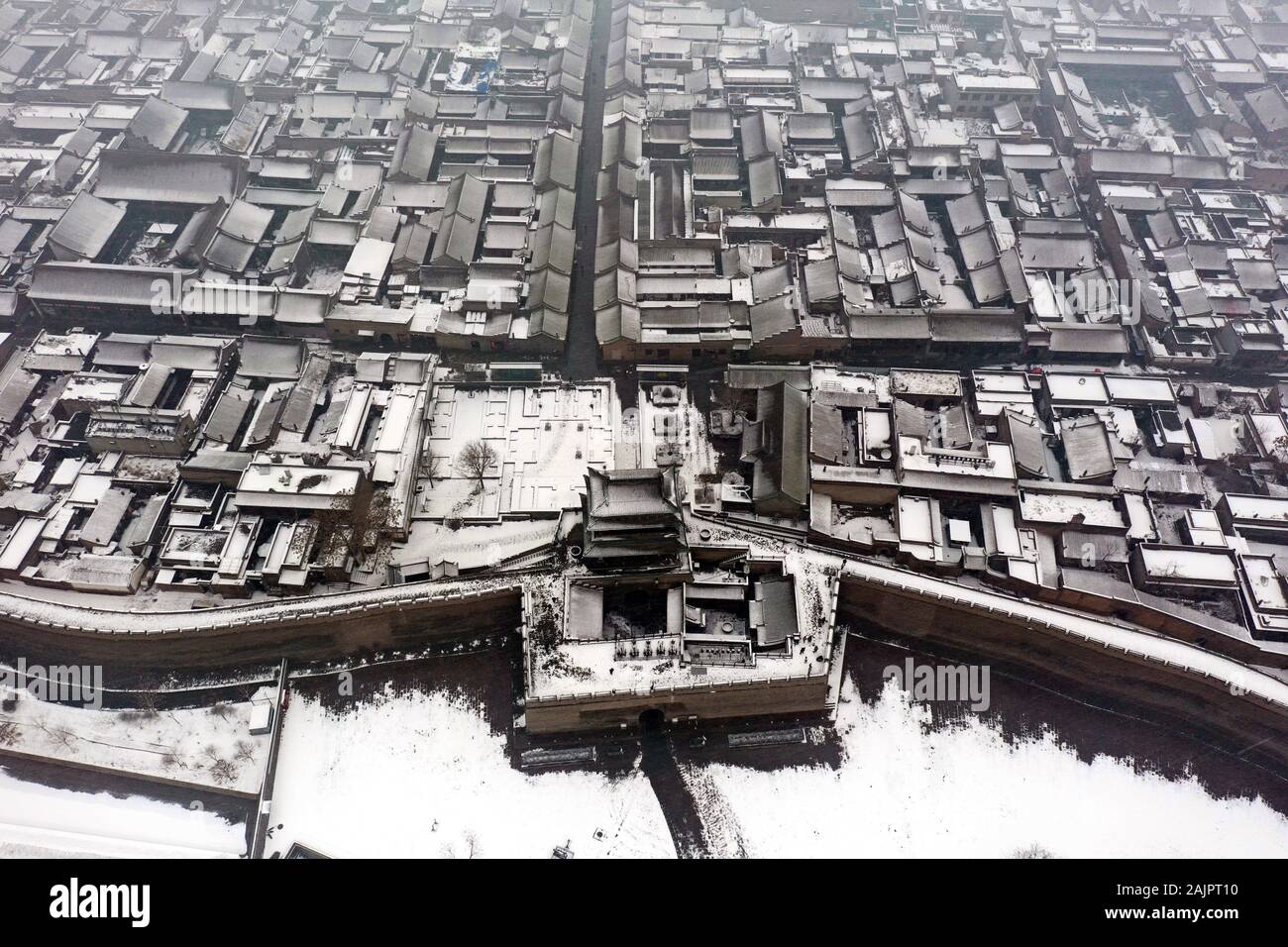Pingyao, China. 5th Jan, 2020. Aerial photo taken on Jan. 5, 2020 shows ...