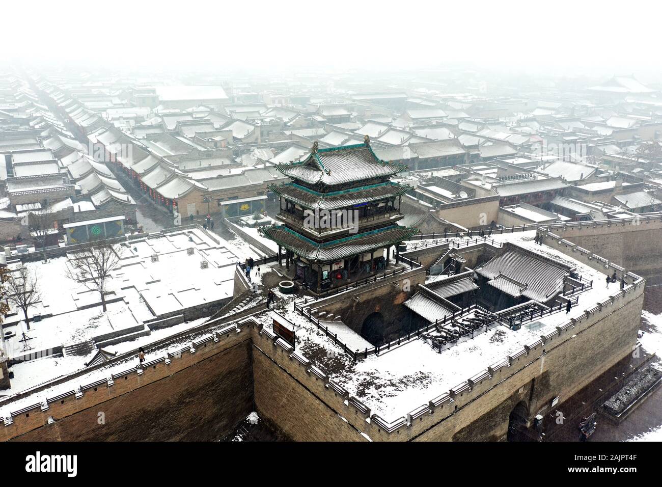 Pingyao, China. 5th Jan, 2020. Aerial photo taken on Jan. 5, 2020 shows ...