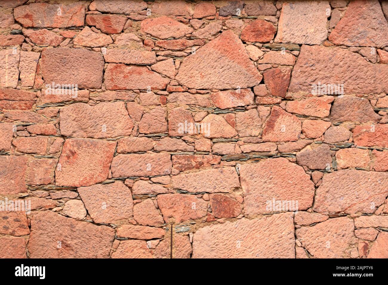 Pattern of a decorative stone wall random size texture background Stock ...