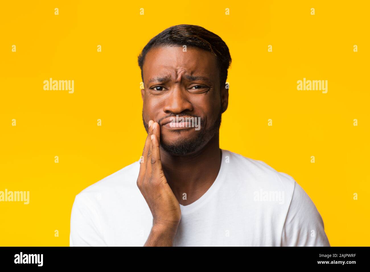 Toothache. Sad African American Man Having Aching Teeth Touching Cheek ...