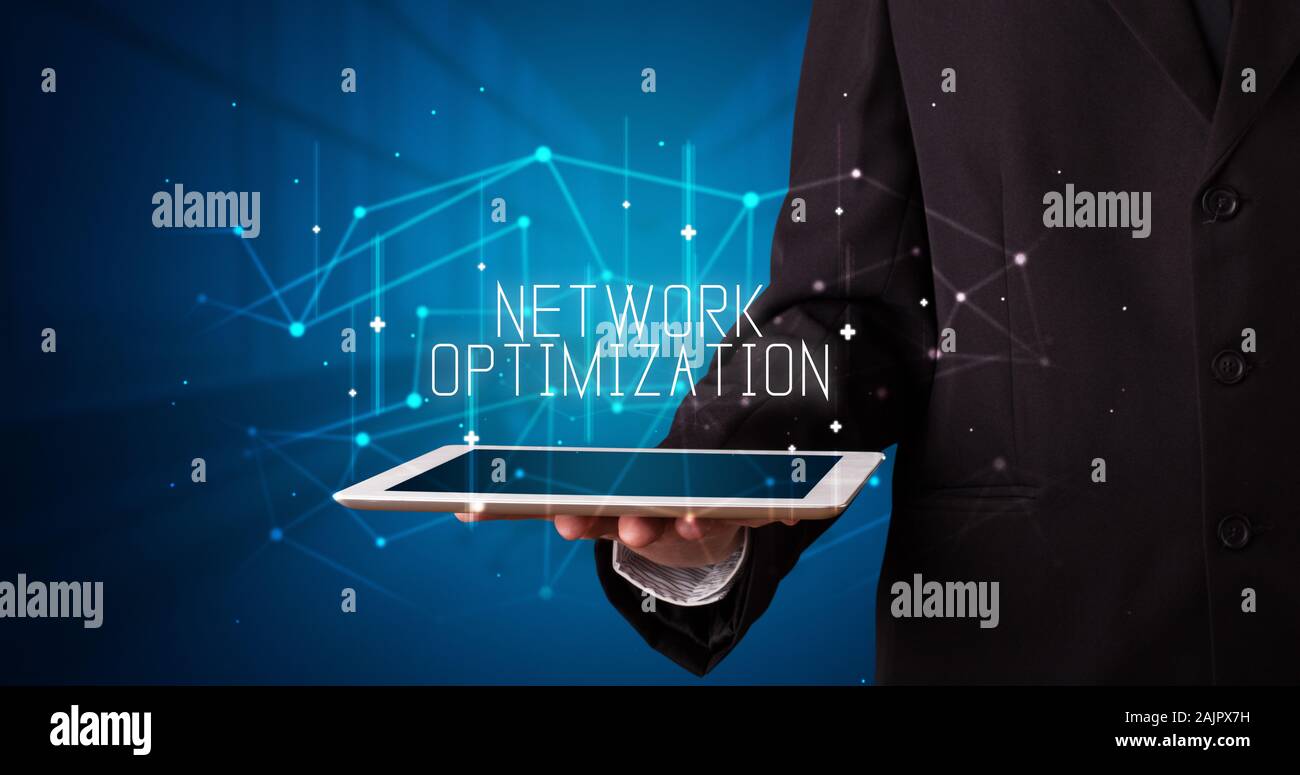 Young business person working on tablet and shows the digital sign ...