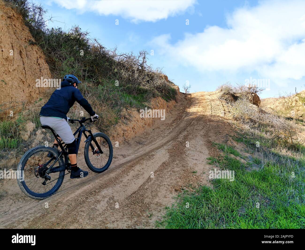 Cyclist on single track road hi-res stock photography and images - Alamy