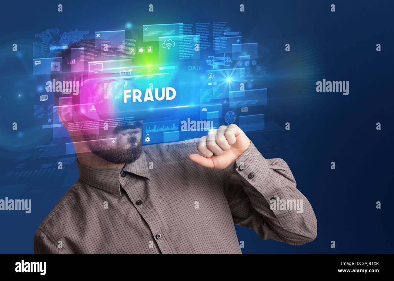 Businessman looking through Virtual Reality glasses with FRAUD ...