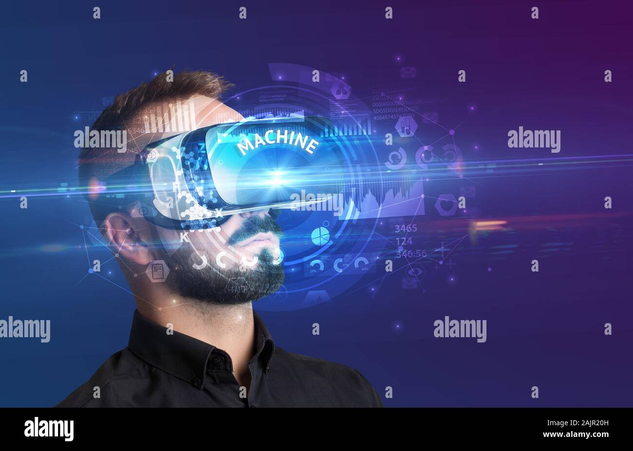 Businessman looking through Virtual Reality glasses with MACHINE ...
