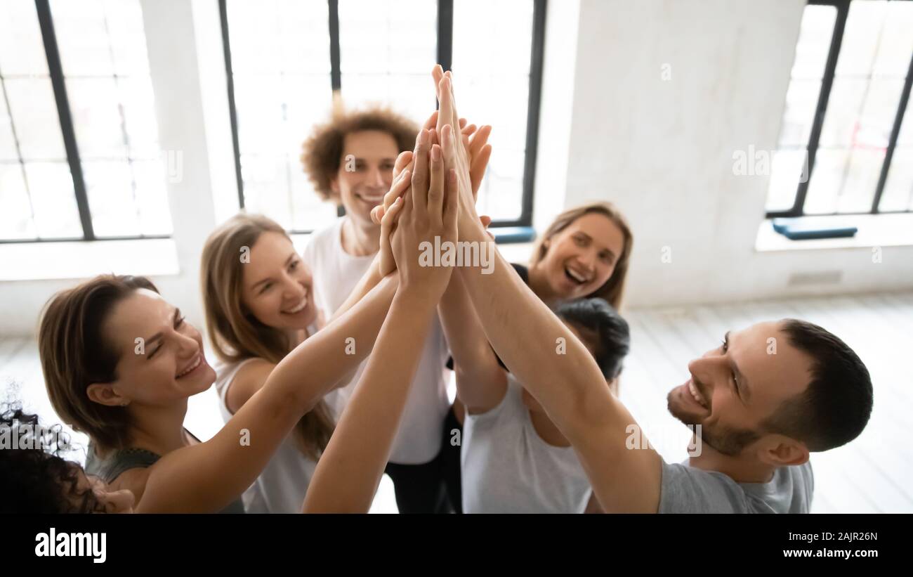 Diverse group people high five hi-res stock photography and images - Alamy