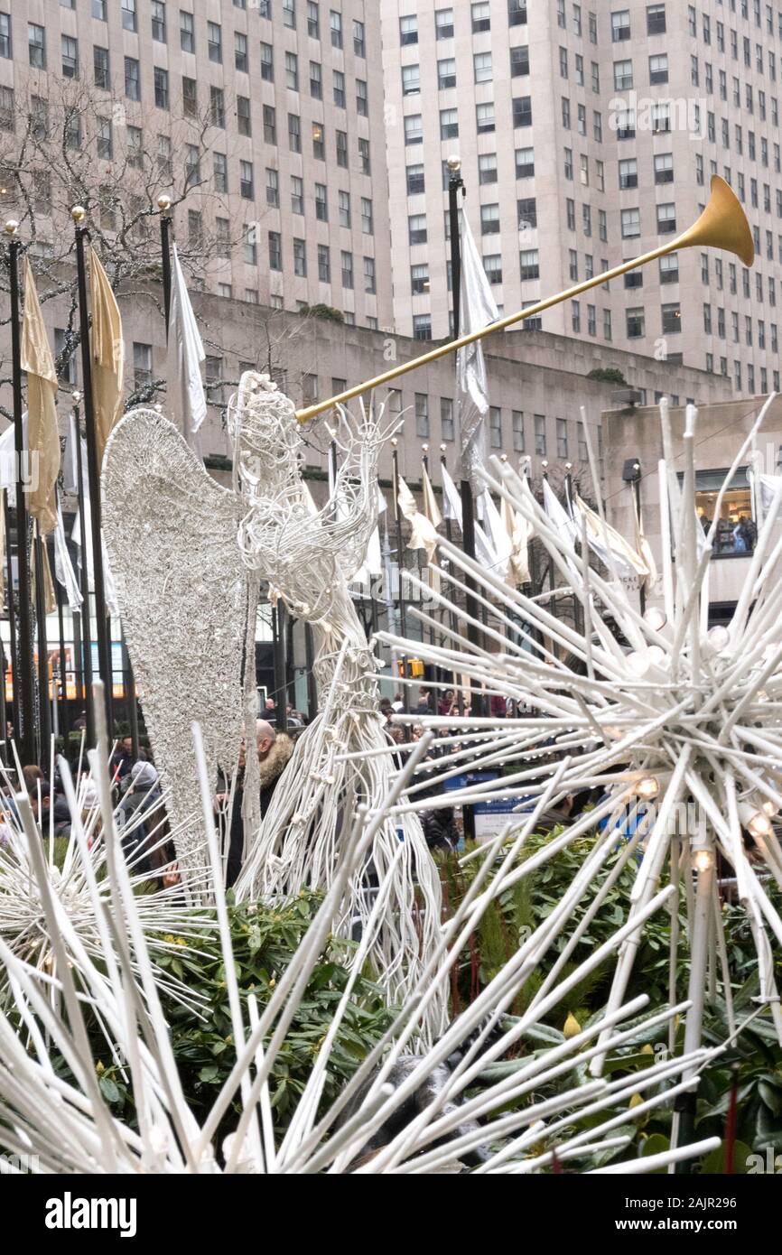 Decorative christmas angels and trumpet at rockefeller center hi-res ...