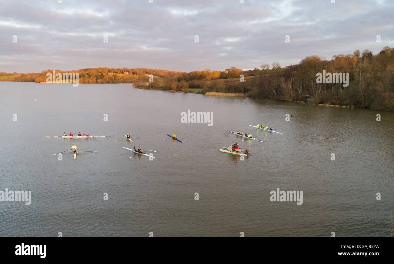 aerial view of canoeists training at first light of ardingly reservoir ...