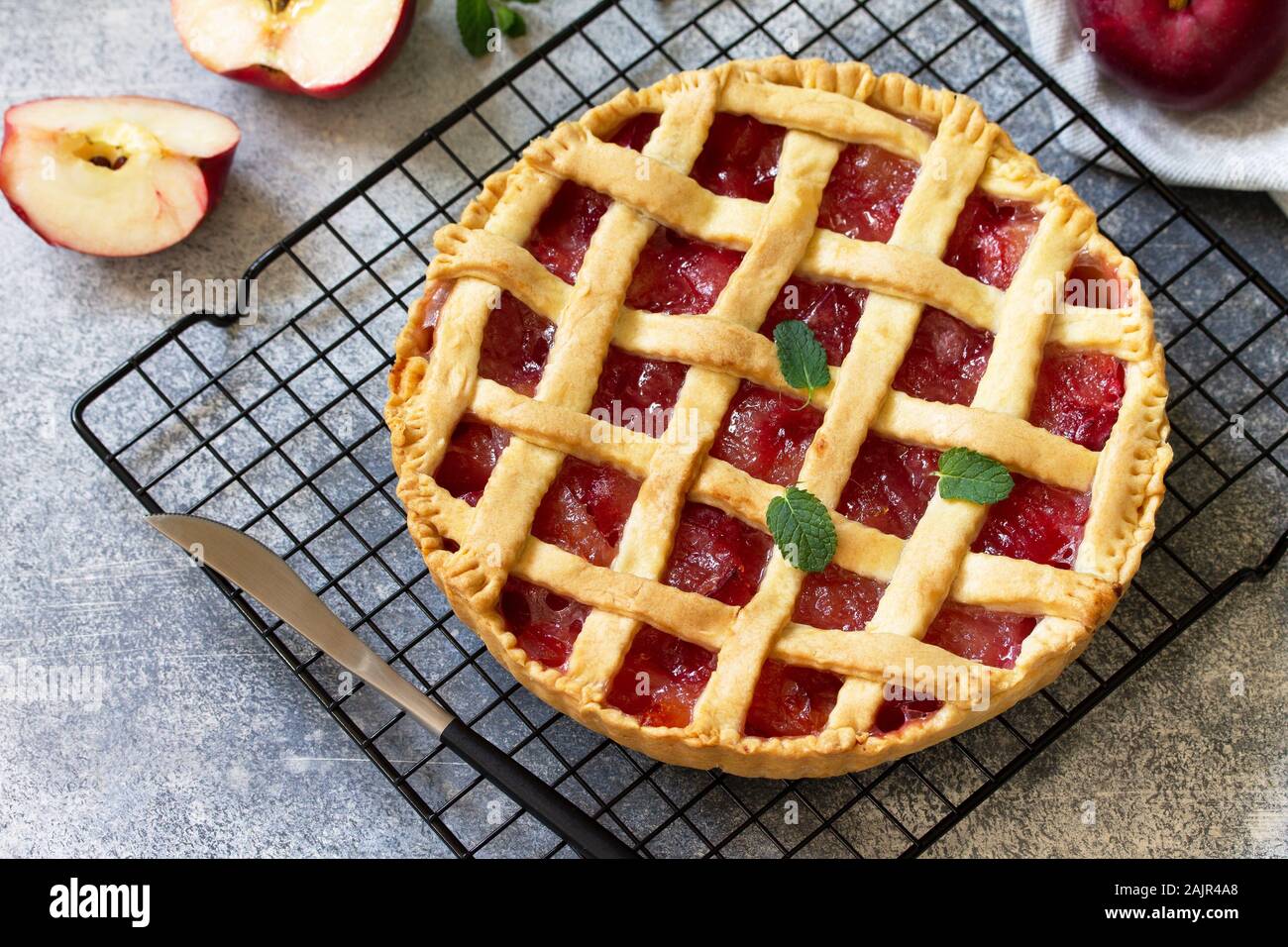 Homemade baking. Autumn apple pie on a light stone or slate table. Free ...