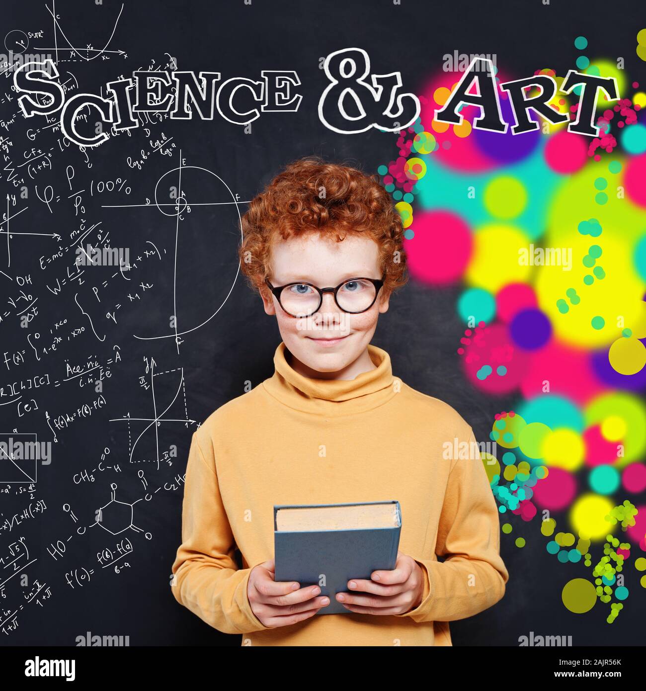 Little boy in student uniform on blackboard background Stock Photo - Alamy