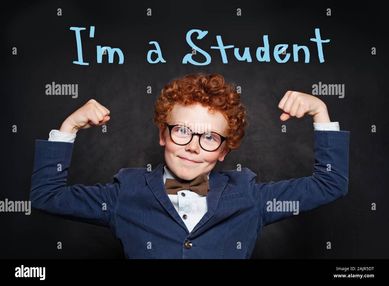 Redhead little boy genius portrait Stock Photo - Alamy