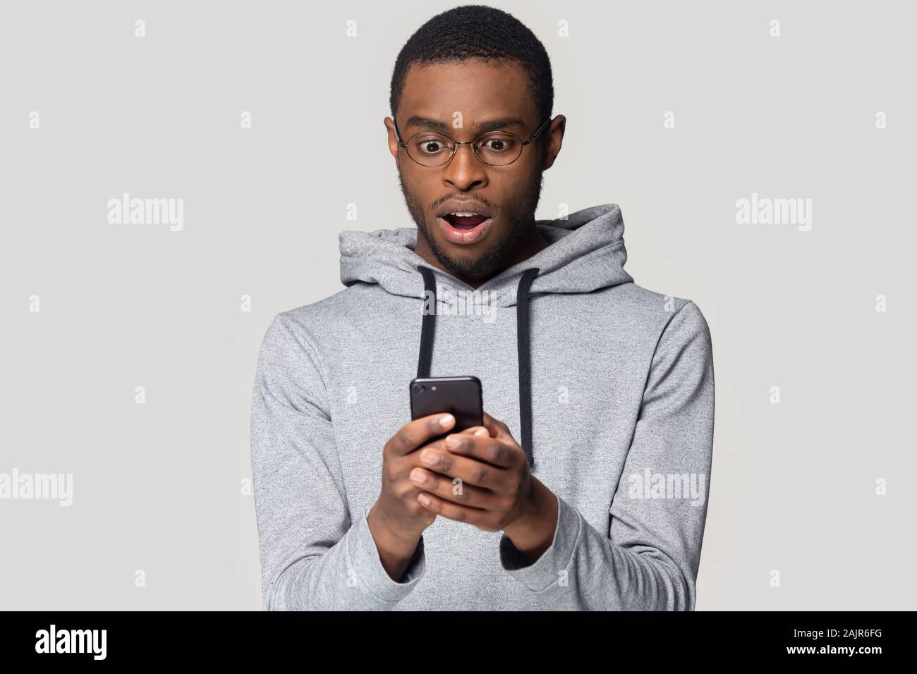 African man received shocking news feels astonished studio shot Stock ...