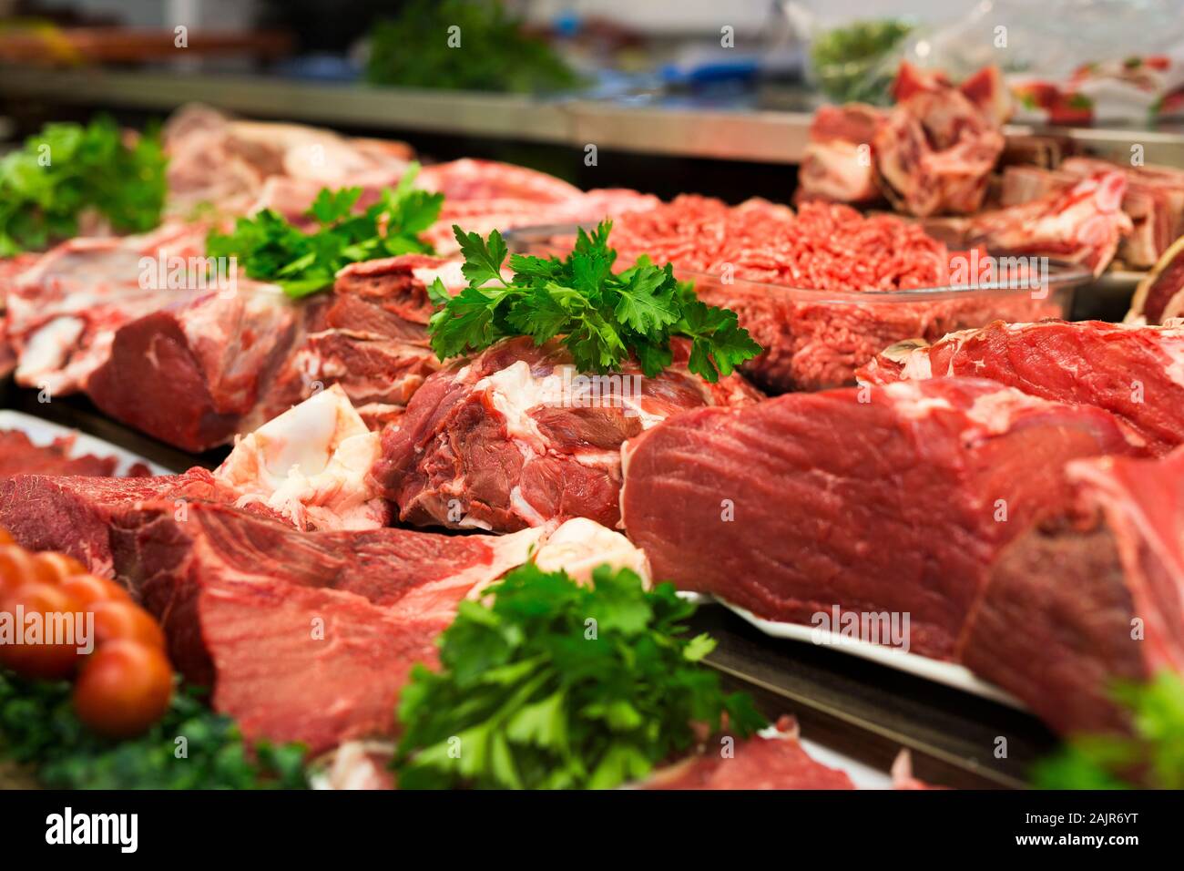 Meat showcase in a butchery Stock Photo - Alamy