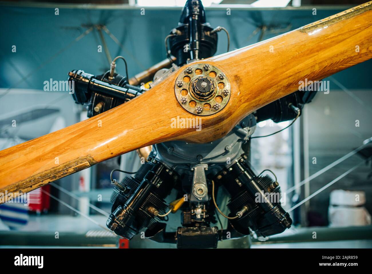 old aircraft engine with wooden propeller Stock Photo - Alamy