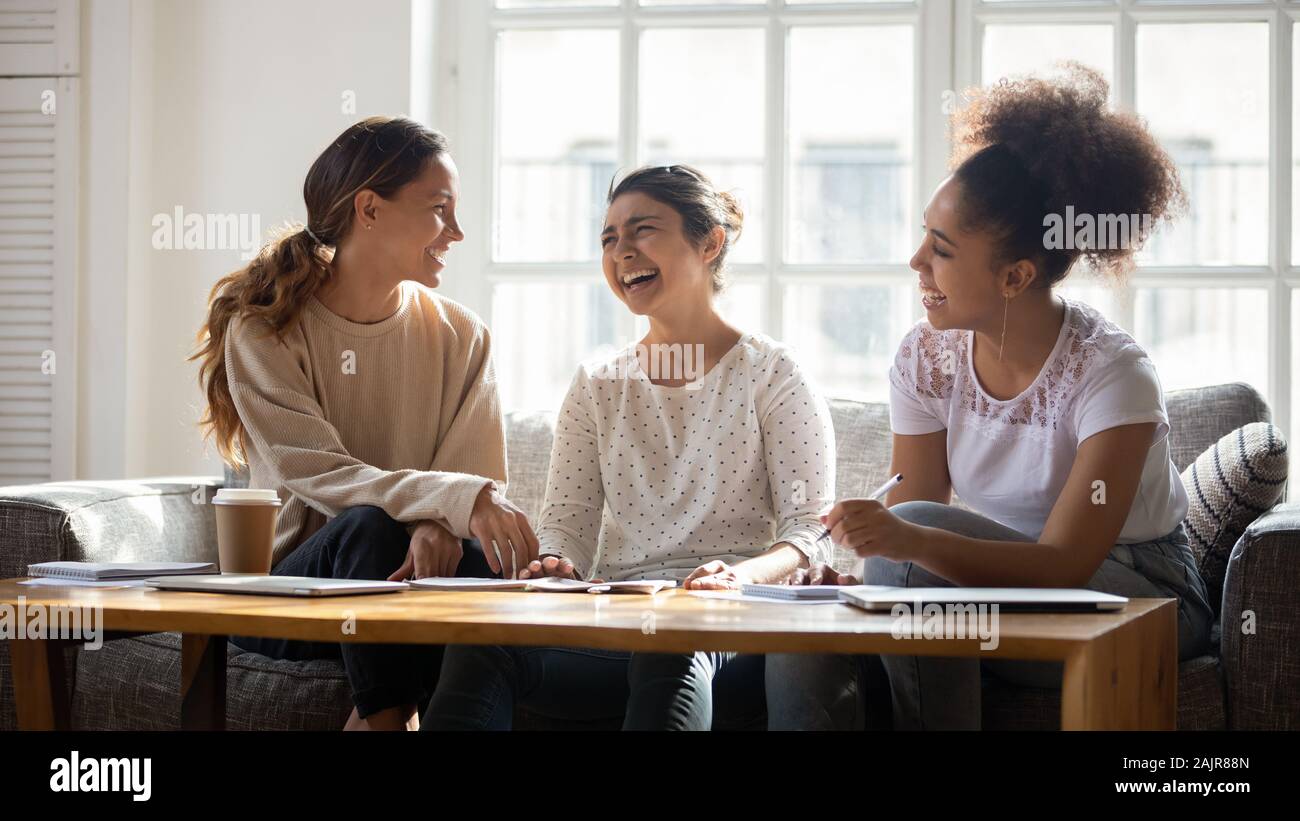 Happy young girls have fun studying together Stock Photo - Alamy