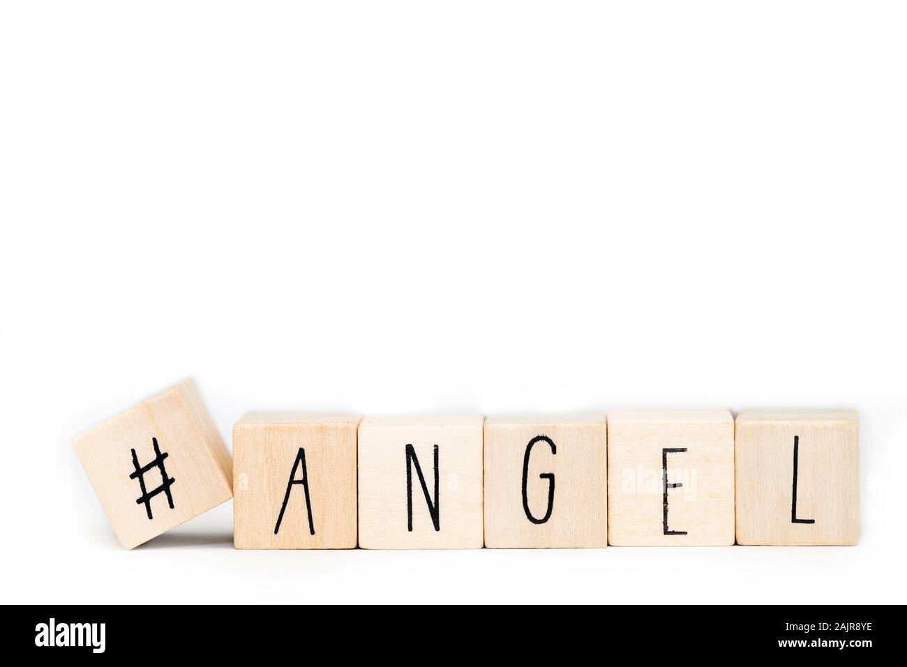 Wooden cubes with a hashtag and the word Angel isolated on white ...