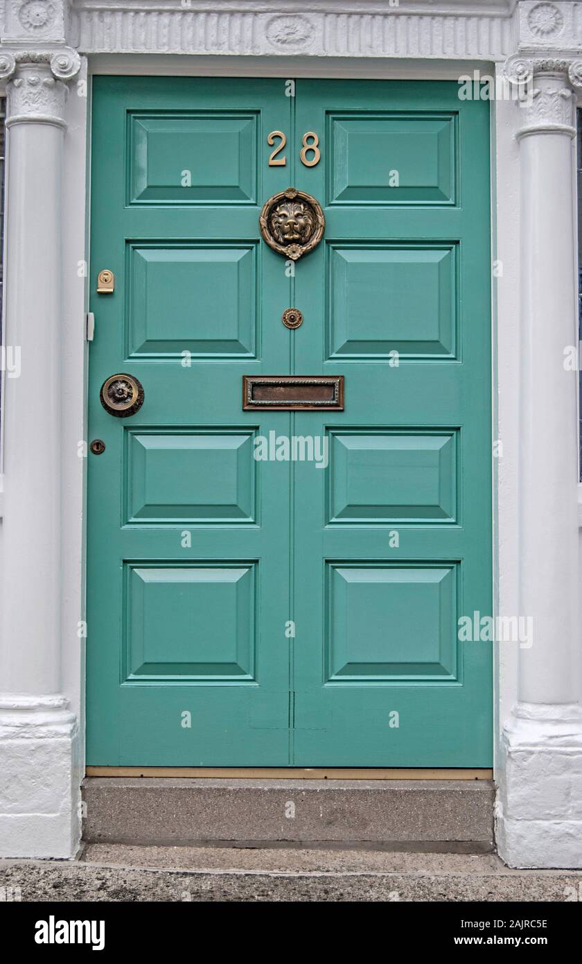 Turquoise colored door in Dublin Stock Photo - Alamy