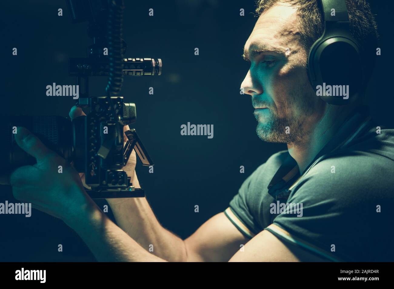 Film Making Industry Theme. Caucasian Cameraman Operator in His 30s ...