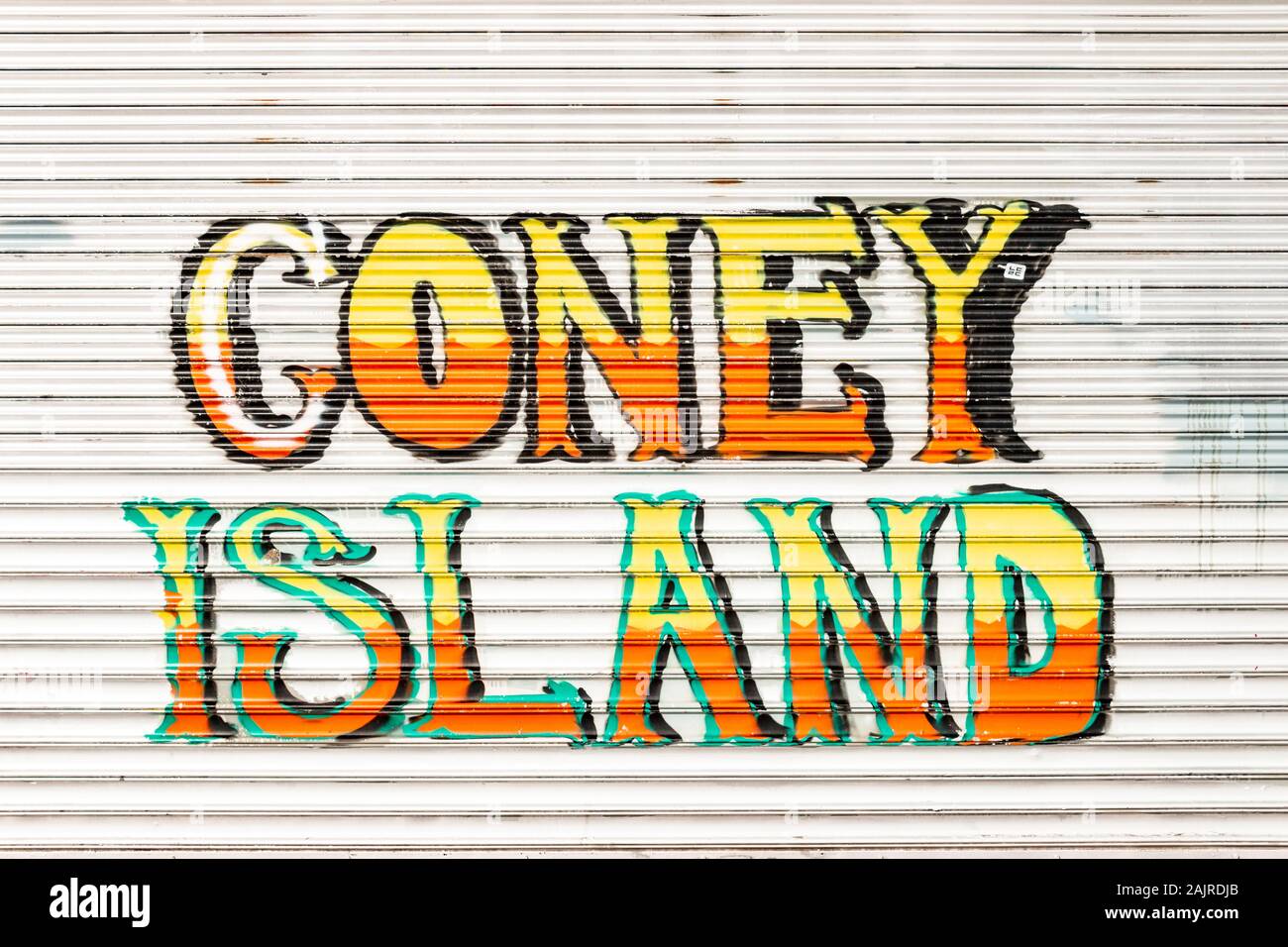 Coney Island graffiti spray painted on a metal roller shutter at Coney ...