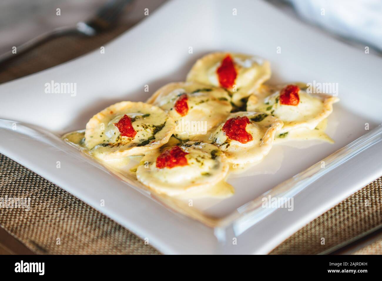 A delicious ravioli is served in a elegance restaurant or hotel Stock ...