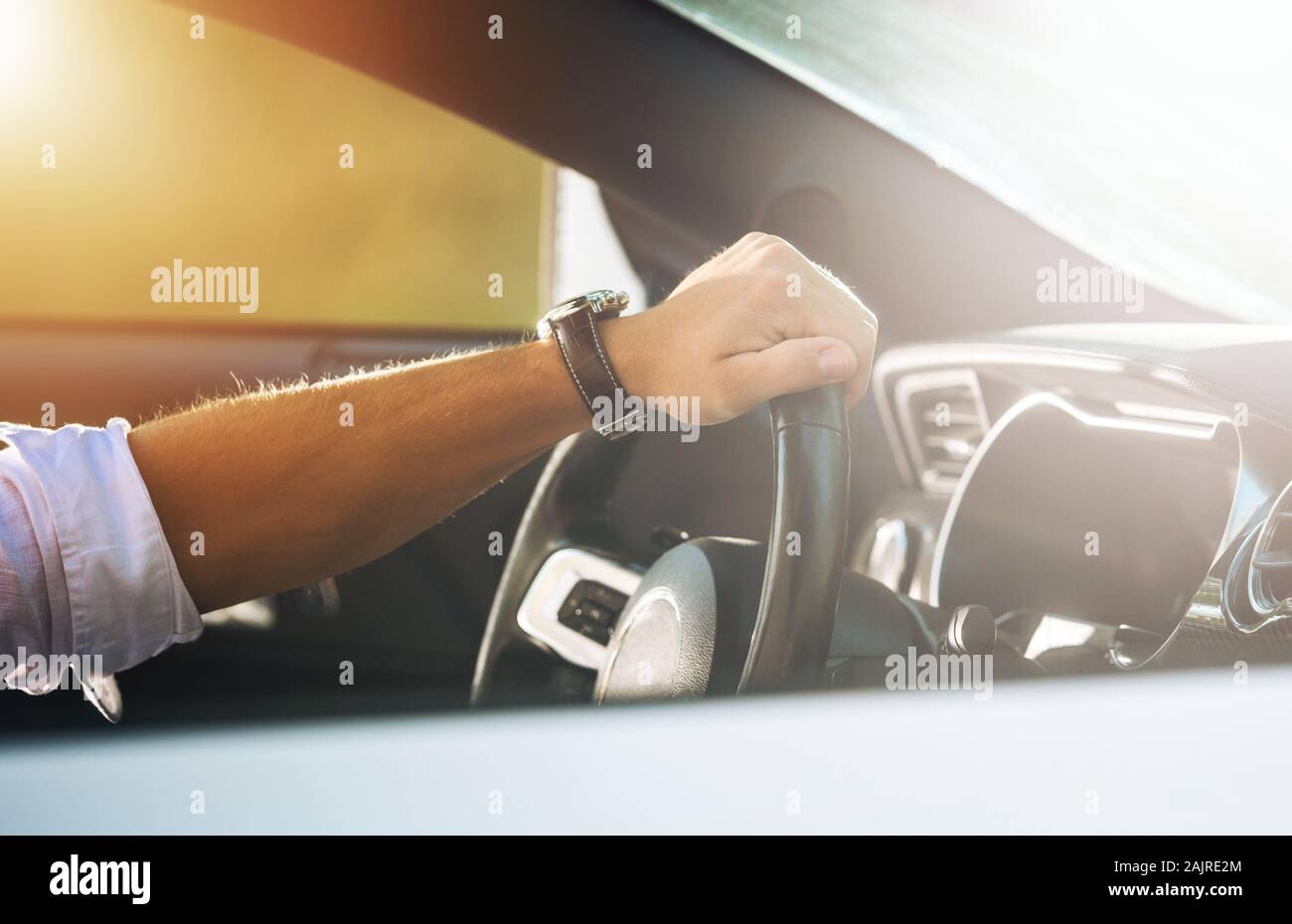 Caucasian Men Driving Modern Vehicle. Hand on Car Steering Wheel ...