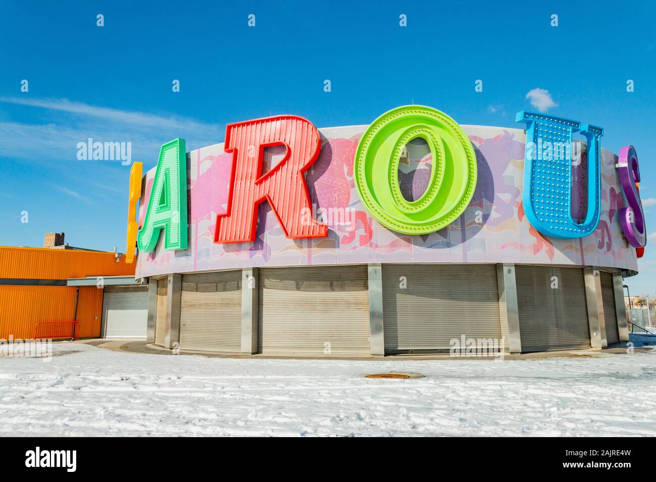 winter scene of large coloured letters spelling carousel at the out of ...