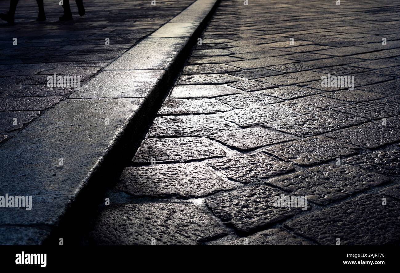 Wet floor of a floor with cobblestones. Puddle formed by rain Stock ...