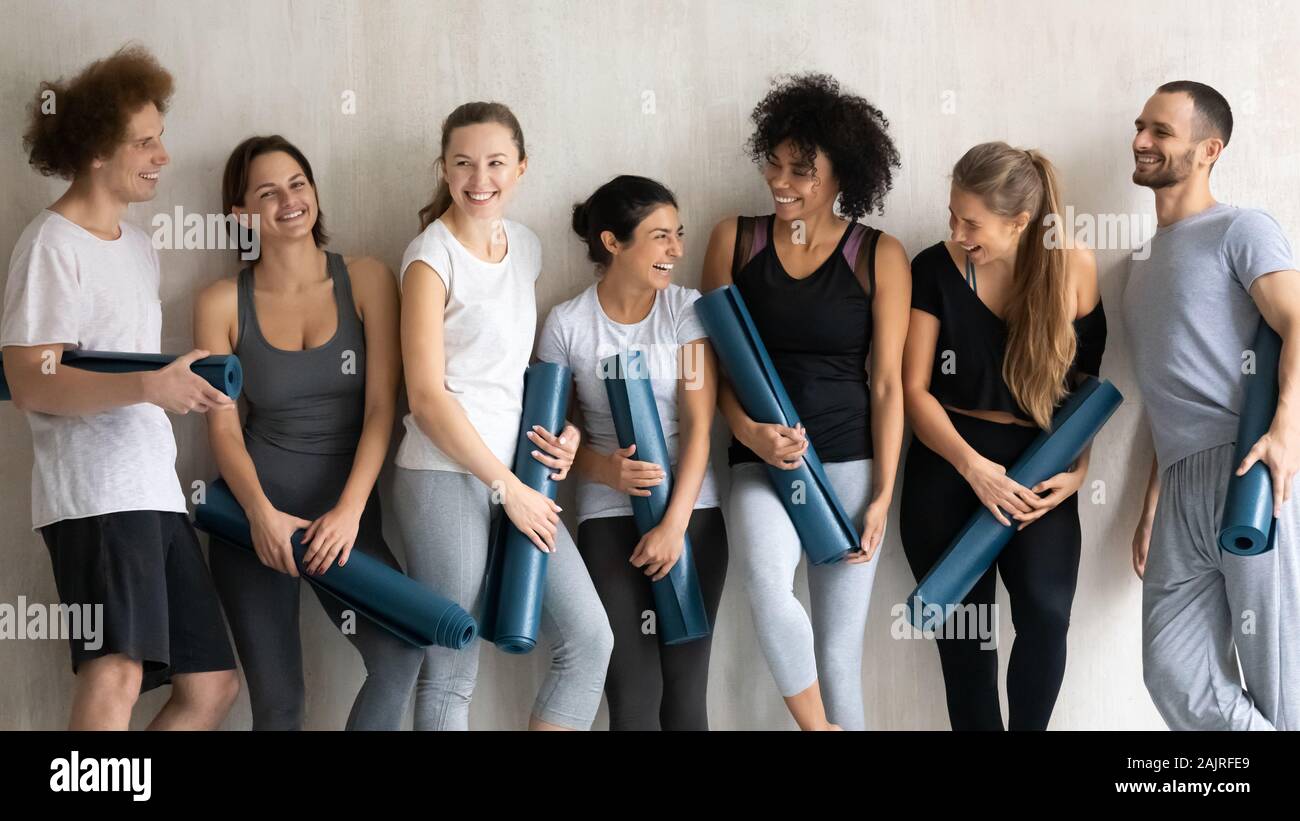 Happy diverse people having fun in studio after yoga training Stock ...