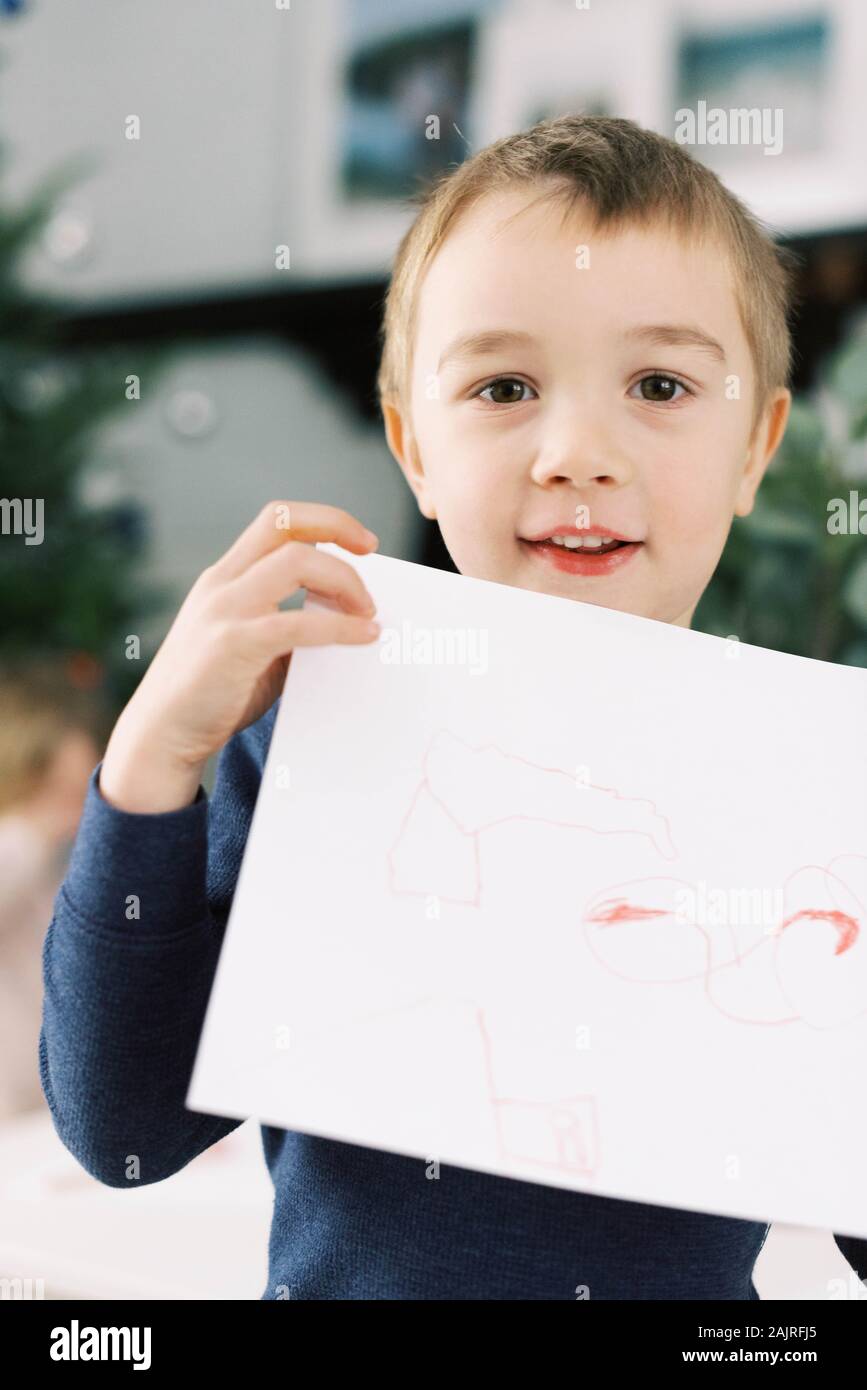 Boy showing off hi-res stock photography and images - Alamy