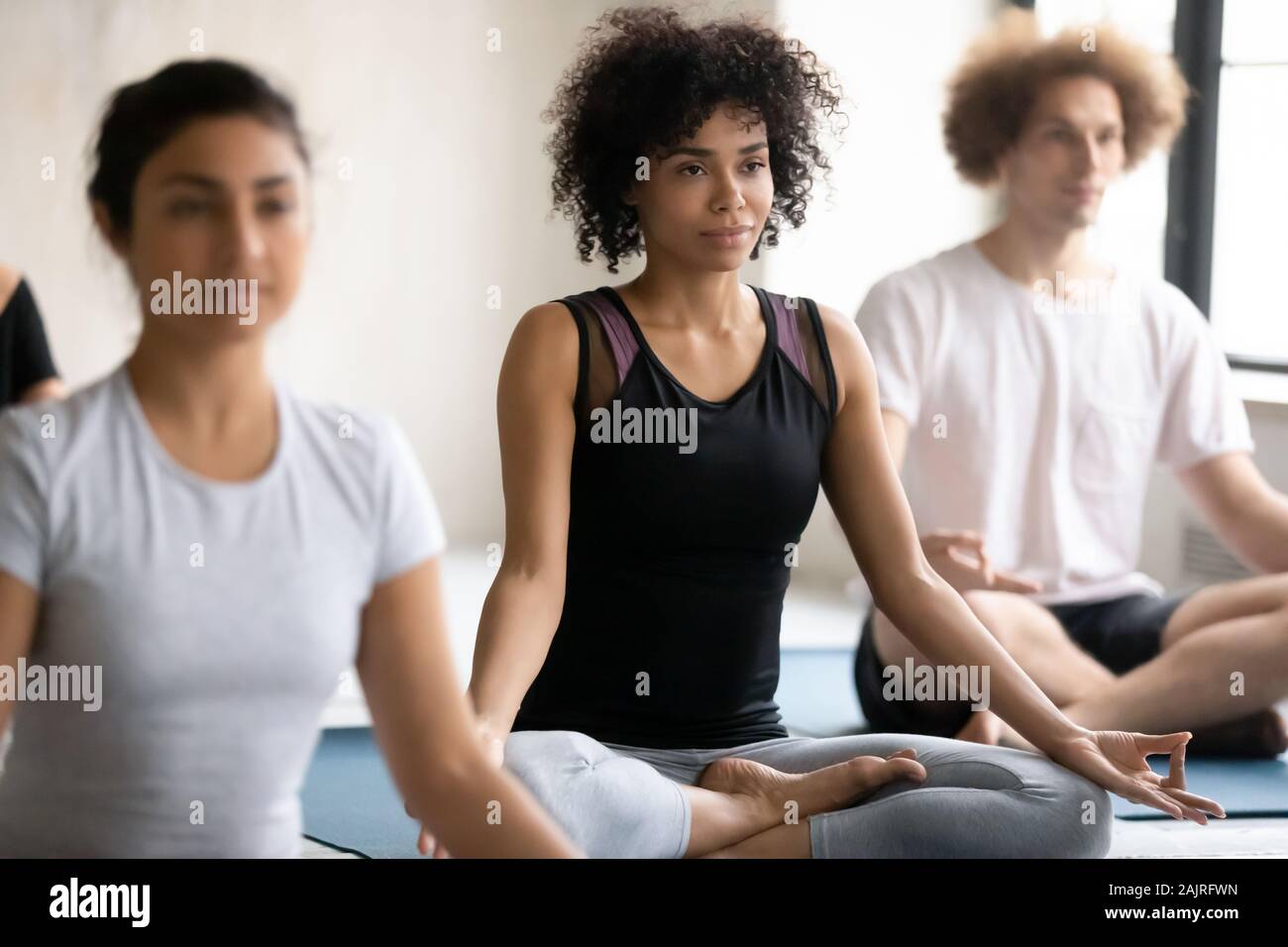 African American woman practicing yoga, doing Padmasana exercise Stock ...