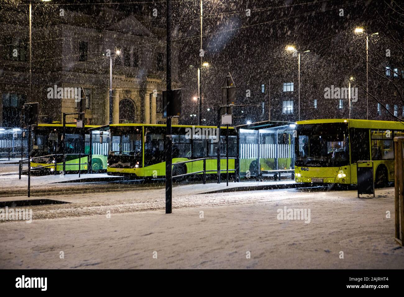 three buses at bus stop in front of reconstructed lviv railway station ...