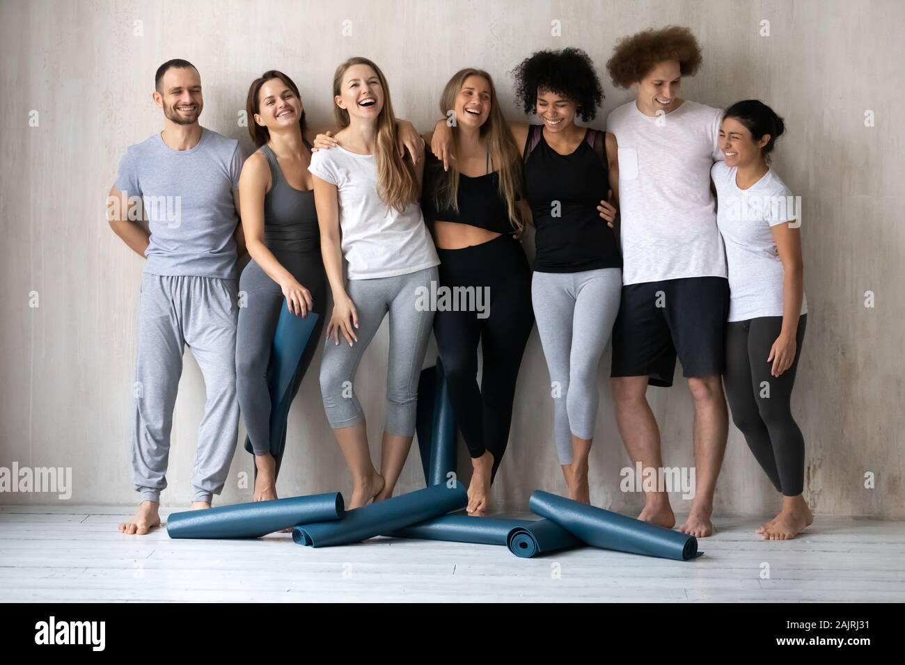 Happy diverse friends having fun after yoga training together Stock ...