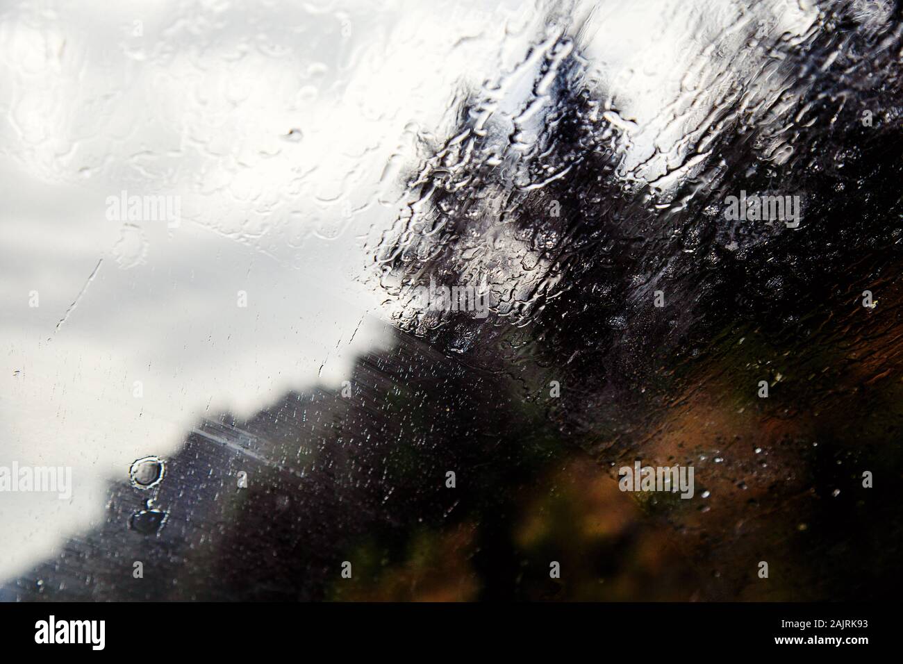 Car window with rain drops. Driving in rain. Weather background. Rainy ...