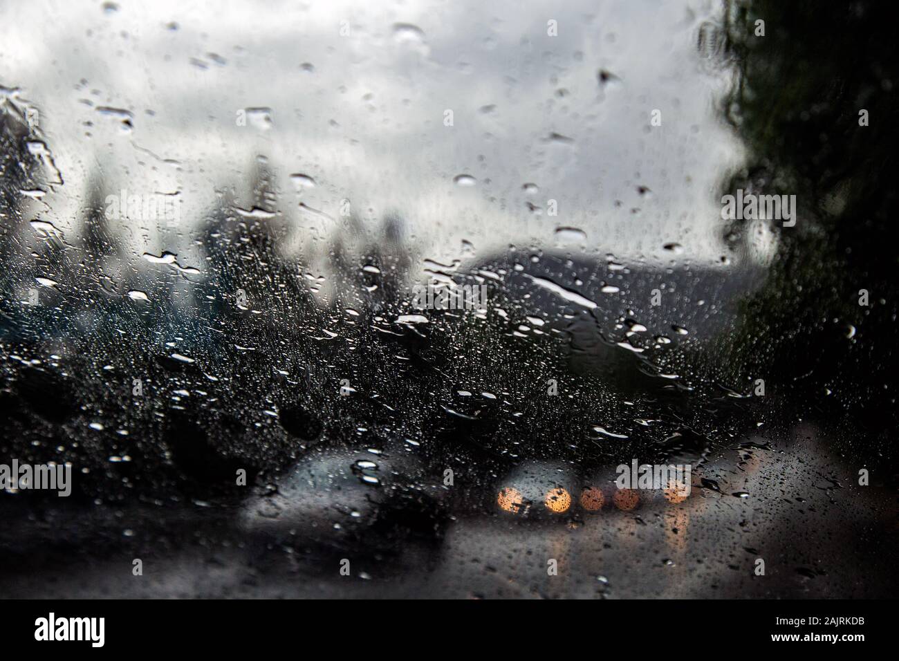 Car window with rain drops. Driving in rain. Weather background. Rainy ...