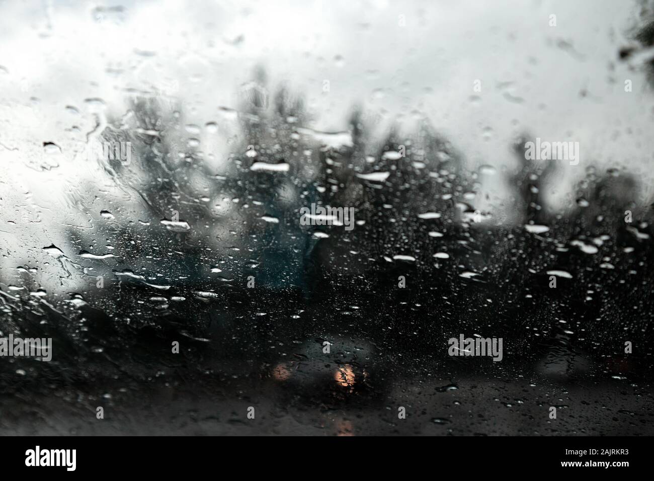 Car window with rain drops. Driving in rain. Weather background. Rainy ...
