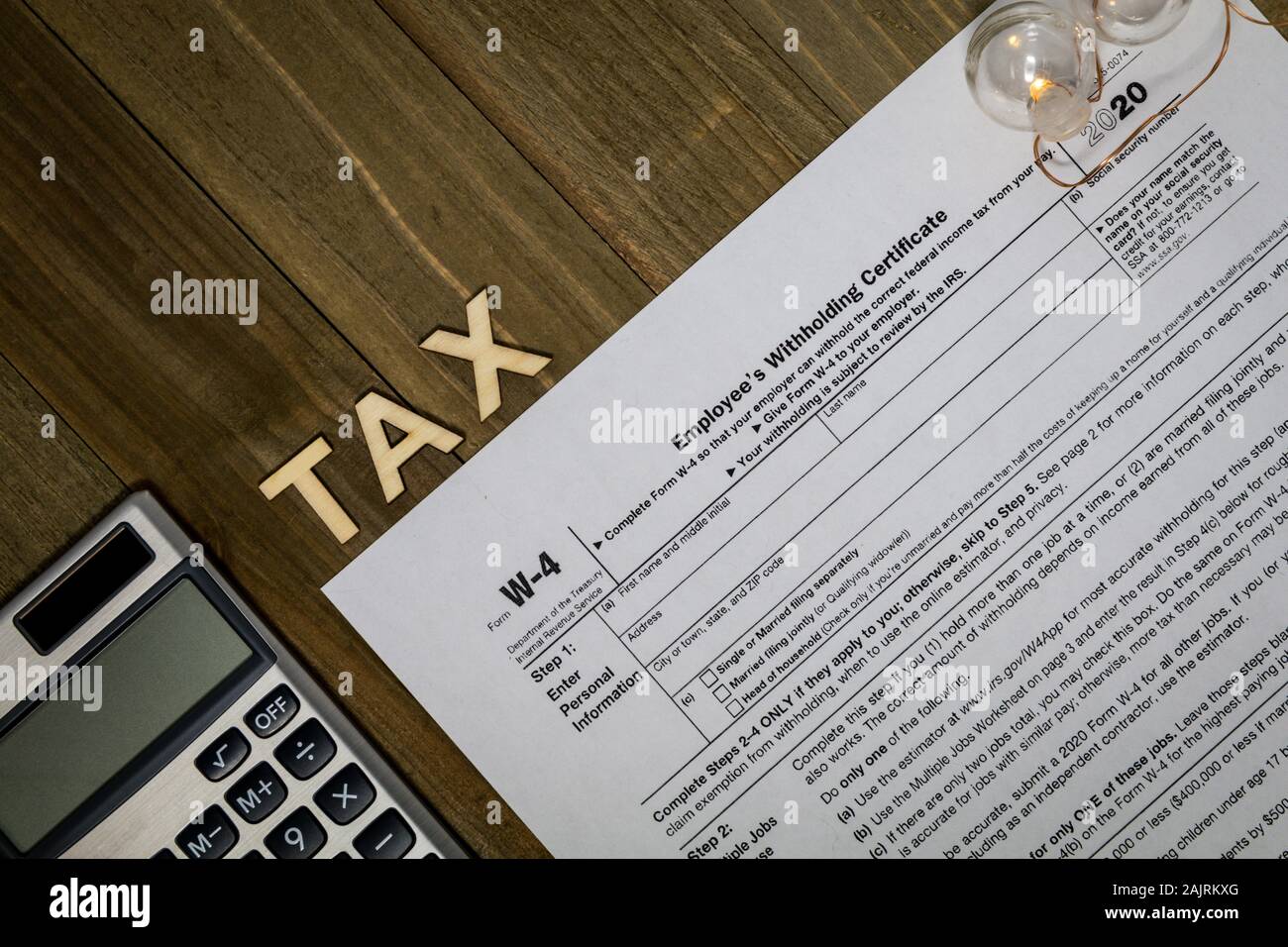 W4 Tax form for 2020 - Employee Withholding Certificate concept to ...