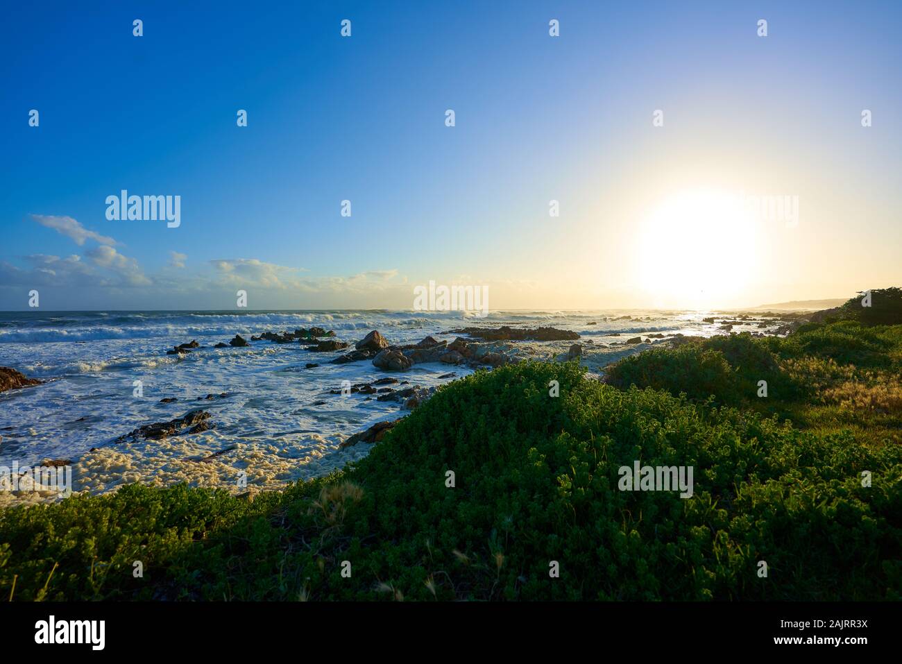 Beach sea sunset hermanus south africa hi-res stock photography and ...