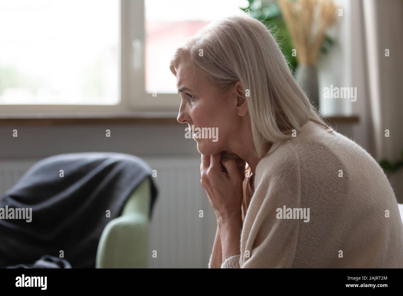Sad wife mourning hi-res stock photography and images - Alamy