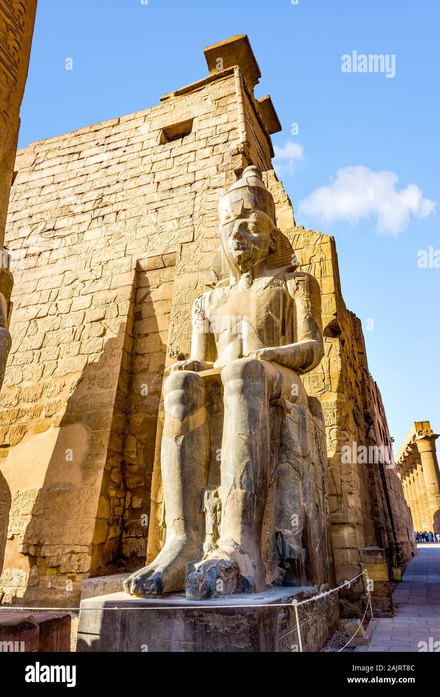 Statue of sitting pharaoh in Karnak Temple, Luxor Stock Photo - Alamy