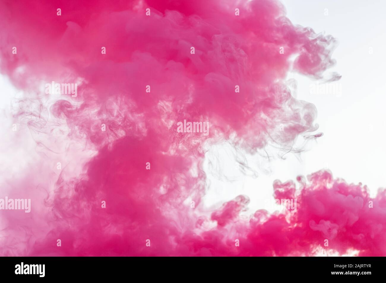 color pink smoke clouds background emotions vortices Stock Photo - Alamy