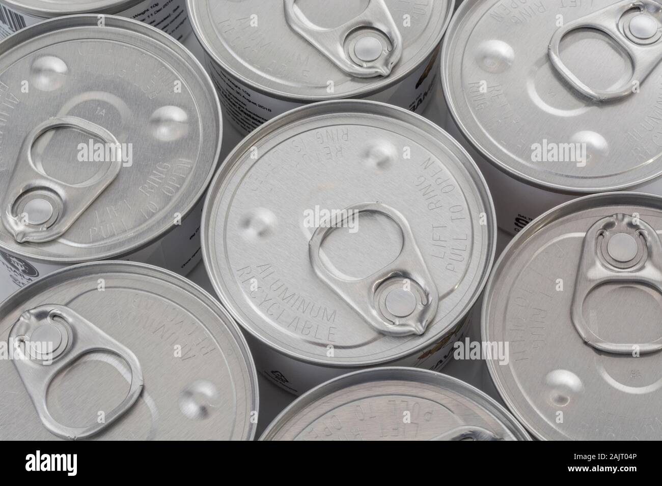 Close-up shot of brushed aluminium ring pull tab on an easy open tin of ...