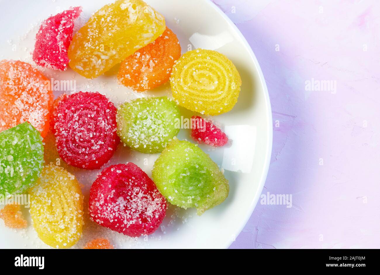 Top view of beautiful color jelly roll and sugar Stock Photo - Alamy