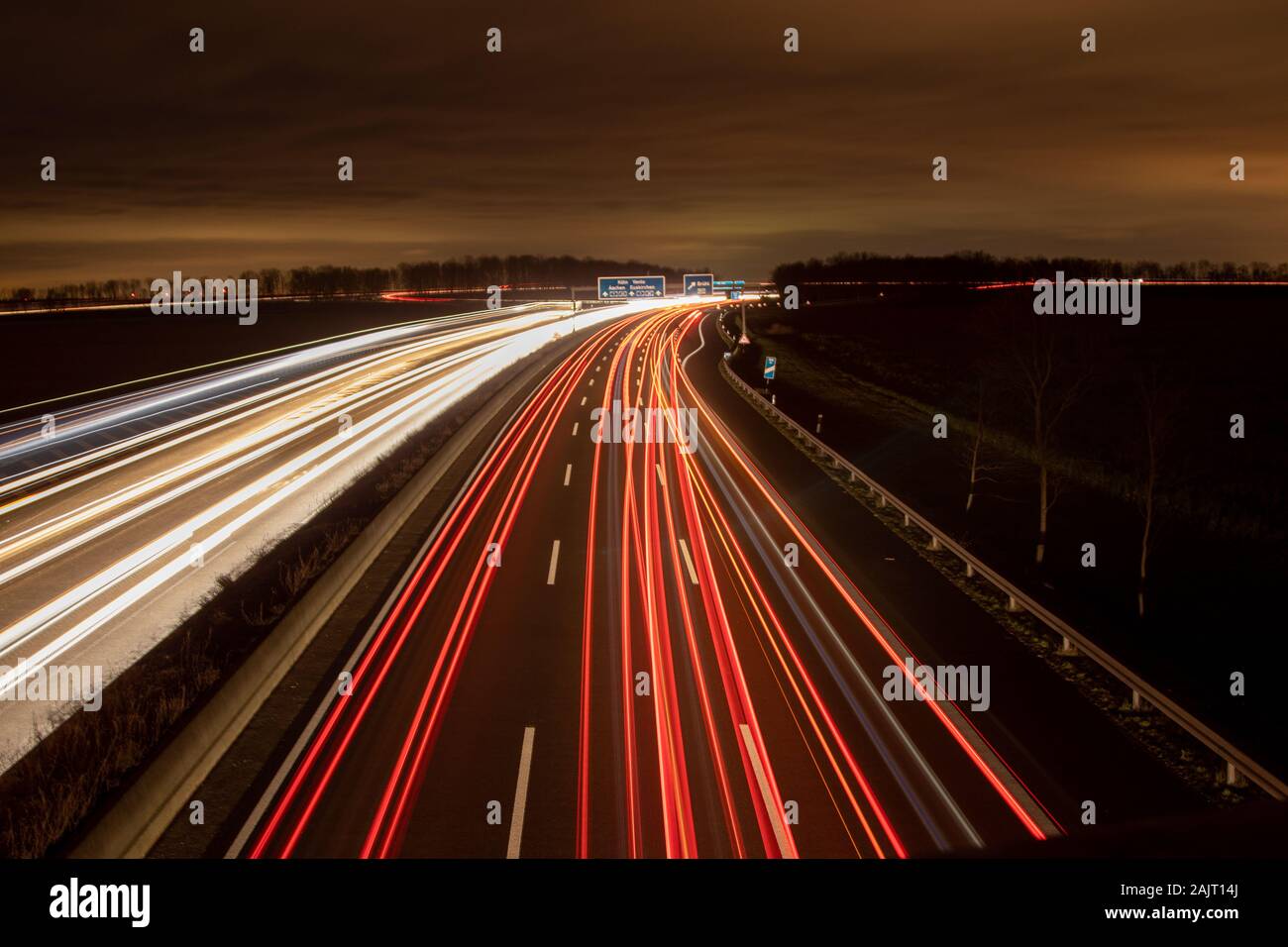 highway in the dark, headlight lights Stock Photo - Alamy